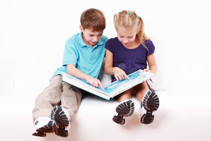 Reading together stock photo. Image of sitting, families - 17508644