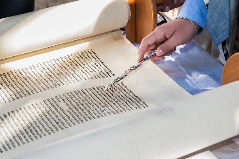 A Reader Holds a Yad or Pointer To Guide Him Across the Ancient Hebrew ...