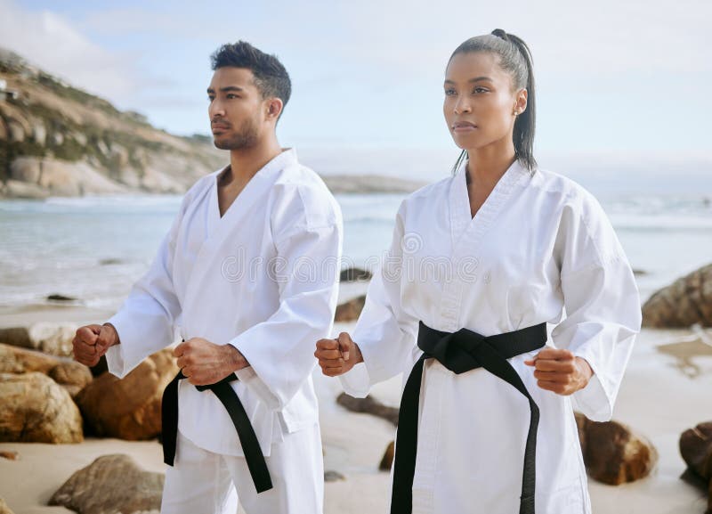 Ready for Action. Shot of Two Young Martial Artists Practicing Karate ...