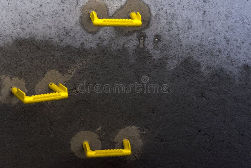 Yellow, Plastic Clamps As Steps Inside a Concrete Drain Chamber . Stock ...