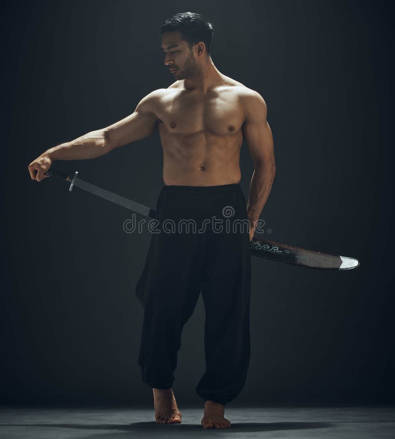 Ready for Battle. Full Length Shot of a Handsome Young Man Standing ...