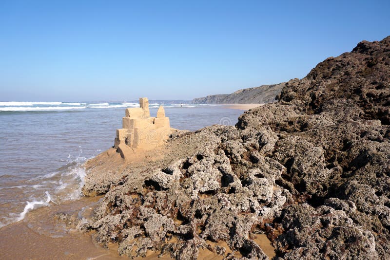 Sand castle at Rocky Beach stock photo. Image of lighthouse - 139331530