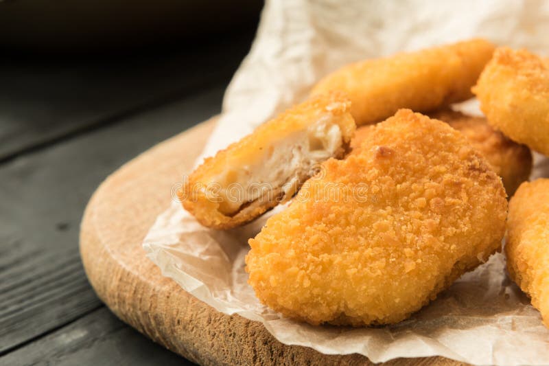 Nuggets in a paper box stock photo. Image of bake, cooked - 175054670