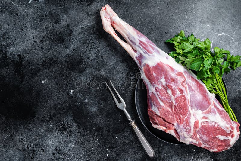 Ready for Cooking Raw Lamb Mutton Leg with Thigh. Black Background. Top ...