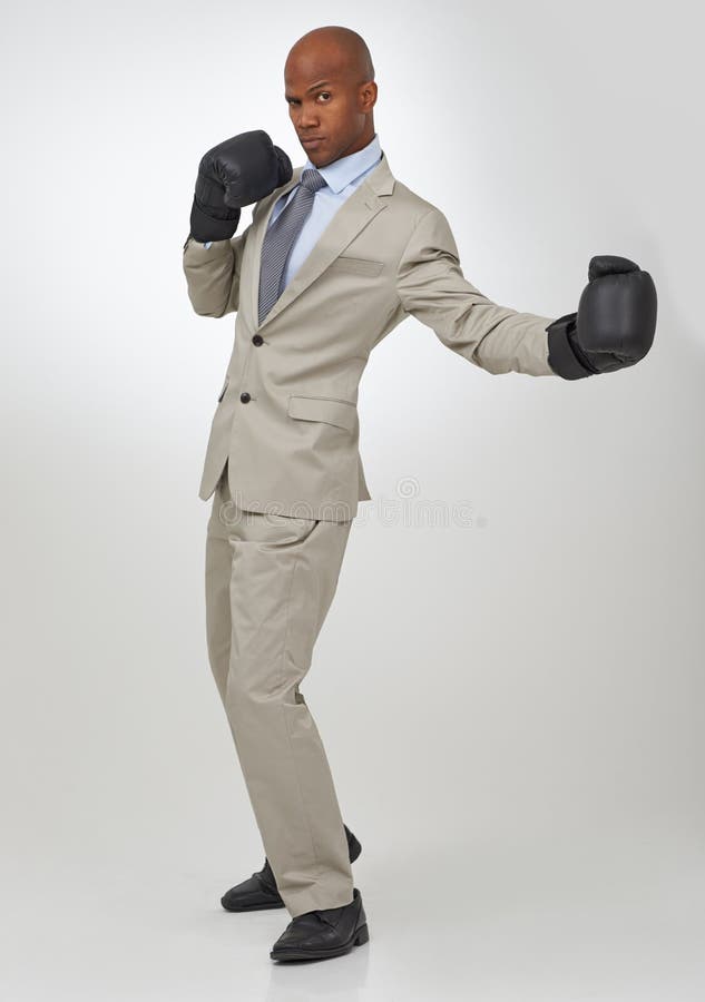 Ready for the Day. an Ethnic Man Standing in a Suit with Boxing Gloves ...