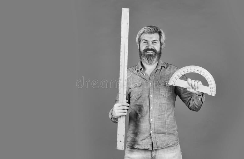 Ready for Engineering. Tool for Graphics. Mature Bearded Man Hold ...