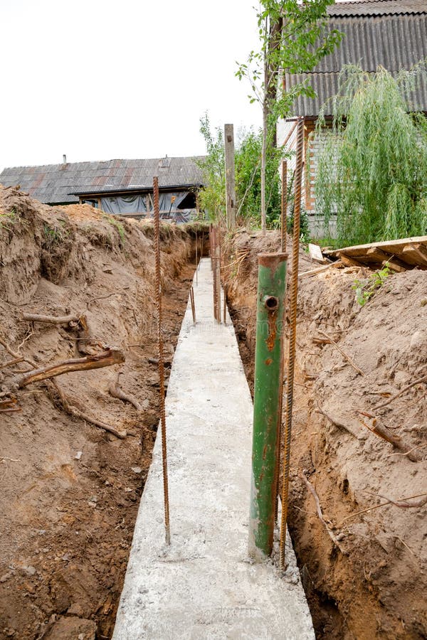 Ready Foundation with Metal Reinforcement and Concrete. Fence Base ...