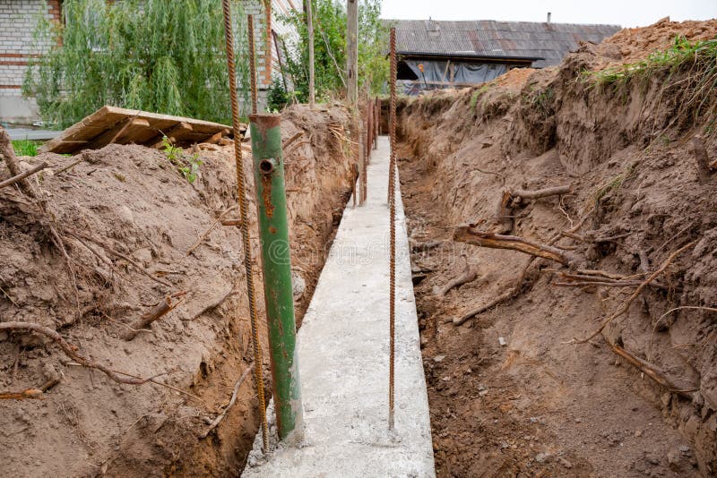Ready Foundation with Metal Reinforcement and Concrete. Fence Base ...