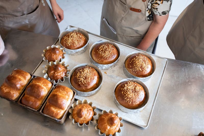 Ready-made Brioches Cool Down on the Table after Baking. Stock Image ...