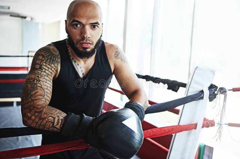 Always Ready. Portrait of a Young Man Training in a Boxing Ring. Stock ...