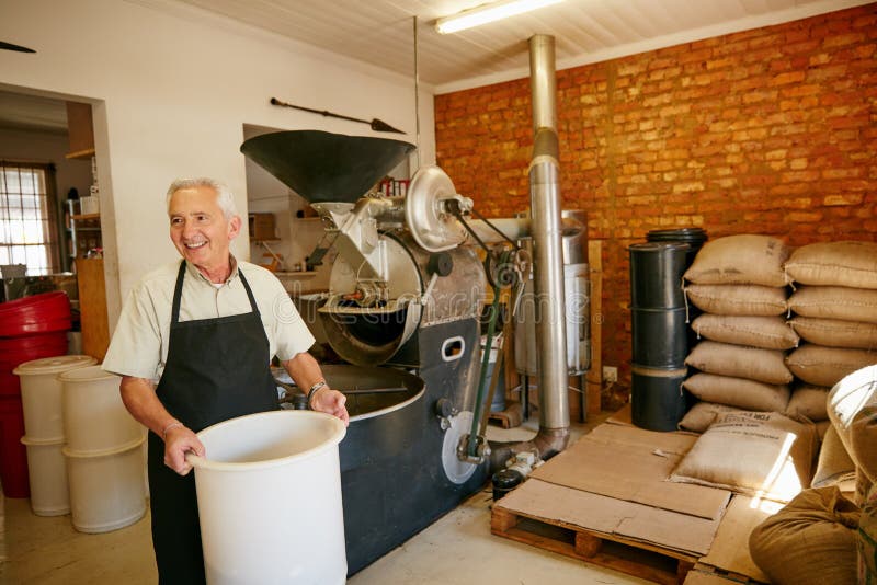 Ready To Be Packed. a Senior Man Working in a Roastery. Stock Photo ...