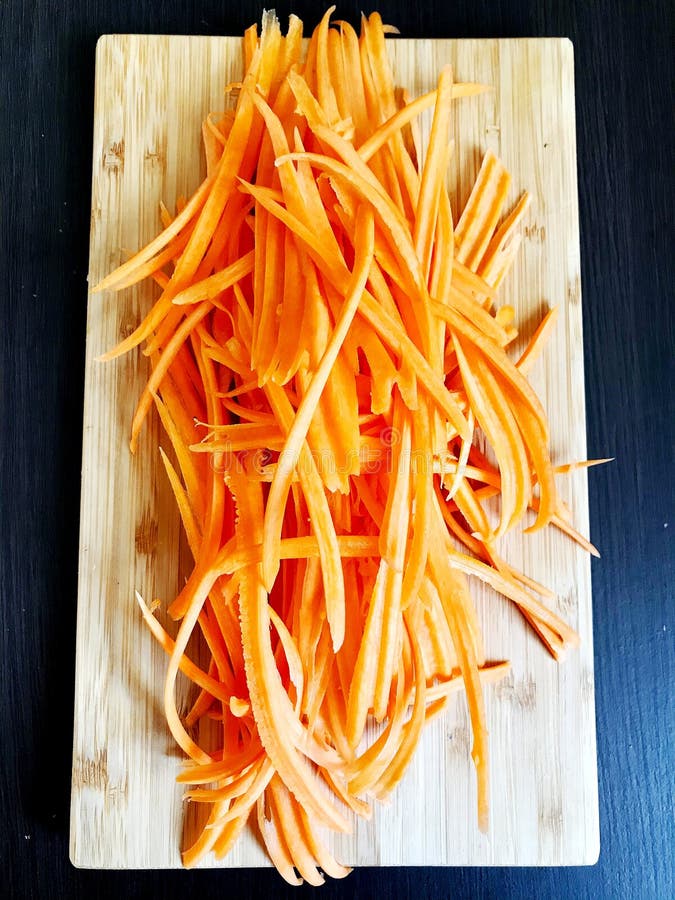 Ready-to-cook Grated Carrots on a Wooden Table Stock Photo - Image of ...