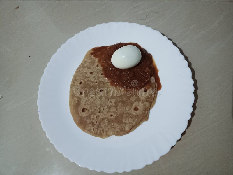 Ready To Eat Chapathi with Egg Curry in a Plate Stock Image - Image of ...