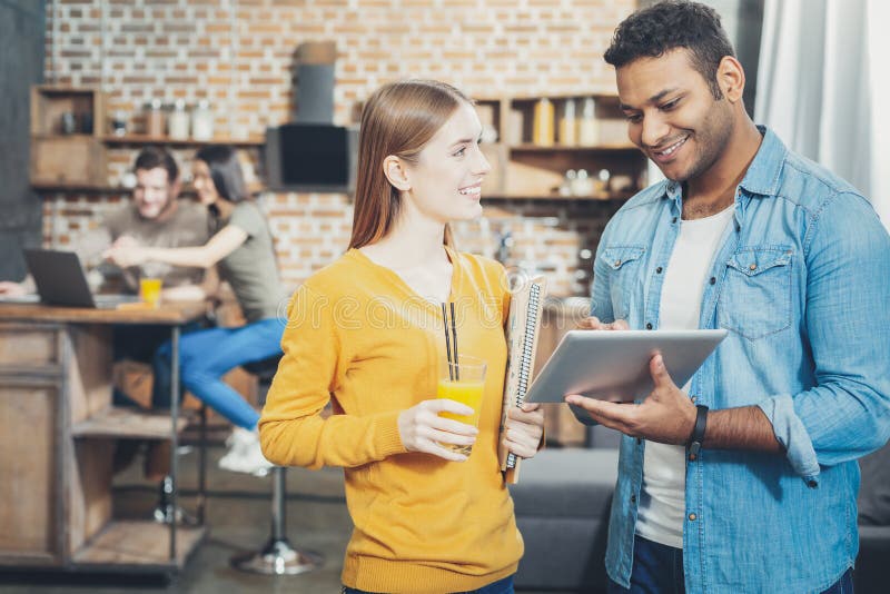Exuberant Two Colleagues Posting Idea Stock Photo - Image of indoors ...