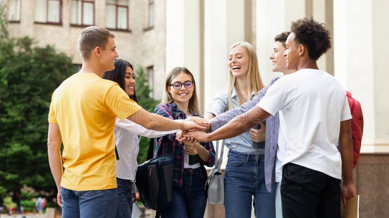 Ready To Pass Exams. Students Stacking Hands Together Stock Image ...