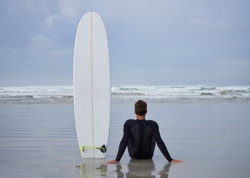 Ready To Take on the Waves. a Young Man about To Go Surfing. Stock ...