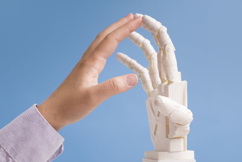 Robot Hand And Human Hand Are Touching. Artificial Intelligence And ...