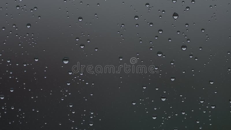 Real Background of Rain Hitting Glass with Protective Coating Stock ...