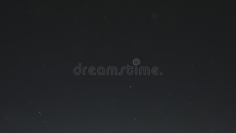 Real Backlit Dust Particles with Light at the Bottom Floating in Slow ...