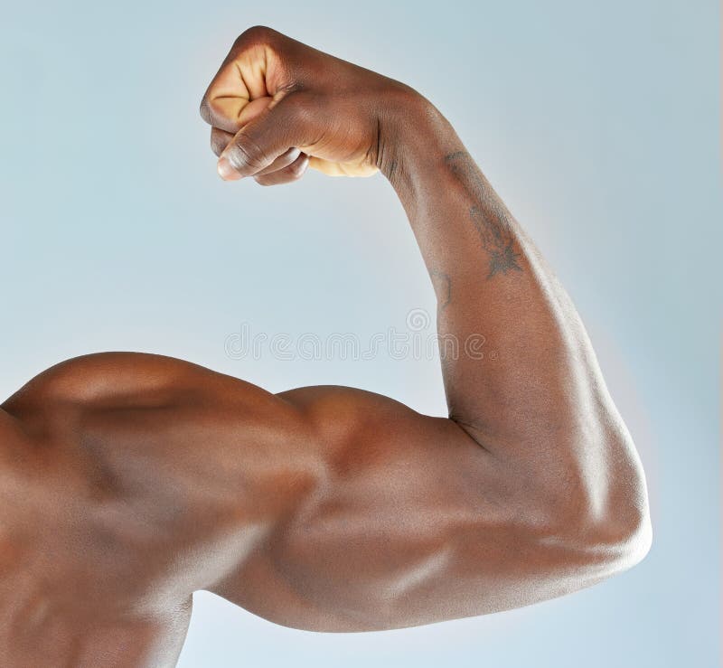 Real Effort Real Results. a Man Flexing His Muscles. Stock Image ...