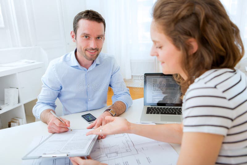 Real Estate Agent and Customer at the Office Stock Photo - Image of ...
