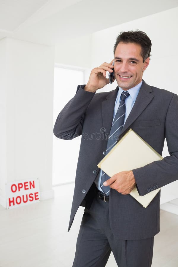Smiling Real Estate Agent Shaking Hands With His New Buyer Stock Image ...
