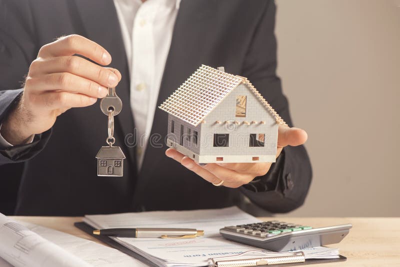 Real Estate Agent Handing Over House Keys. Stock Image - Image of ...