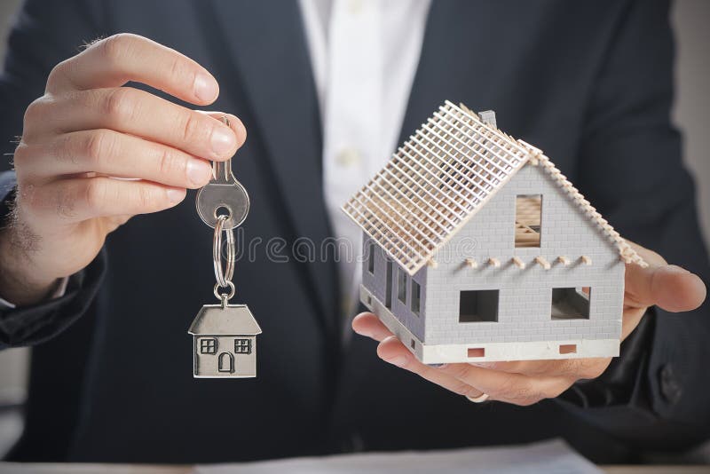 Real Estate Agent Handing Over House Keys. Stock Photo - Image of deed ...