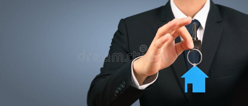 Real Estate Agent Handing Over House Keys in Hand Stock Image - Image ...