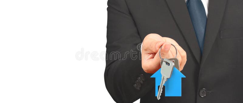 Real Estate Agent Handing Over House Keys in Hand Stock Photo - Image ...