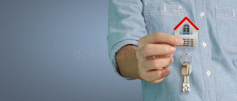 Real Estate Agent Handing Over House Keys in Hand Stock Image - Image ...