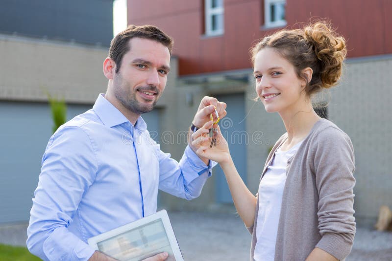 Real Estate Agent Handing Over Keys Stock Image - Image of countryside ...