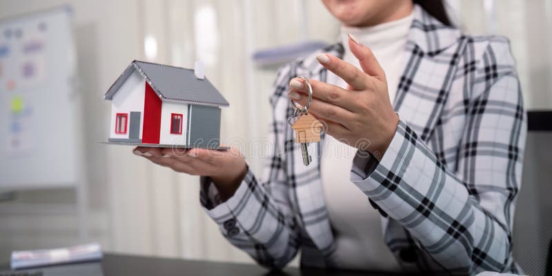 Real Estate Agent with House Model and Key Stock Image - Image of ...