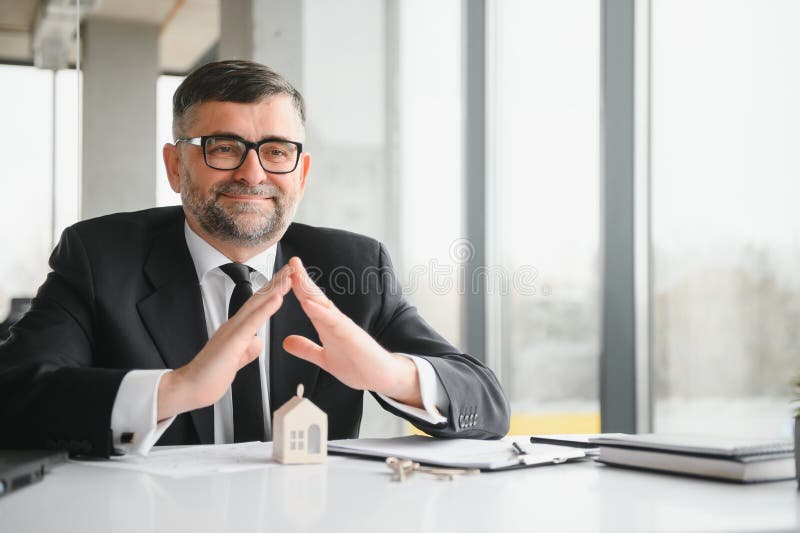 Real Estate Agent with House Model and Keys Stock Photo - Image of ...