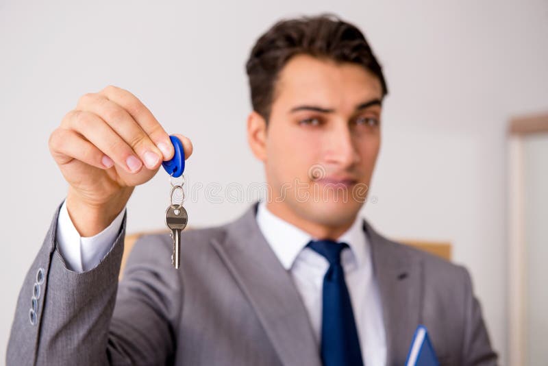 The Real Estate Agent with Key from New House Stock Image - Image of ...