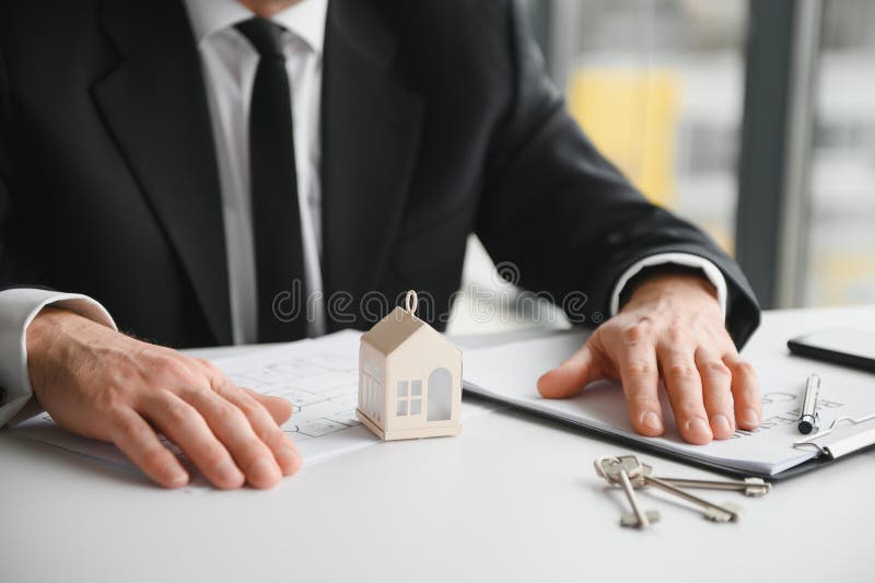 Real Estate Agent in Office Stock Image - Image of designer ...