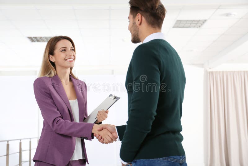 Real Estate Agent Shaking Hands with Client Stock Photo - Image of ...