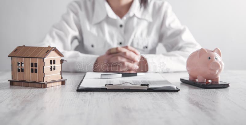 Real Estate Agent Working in Office. Real Estate Concept Stock Photo ...