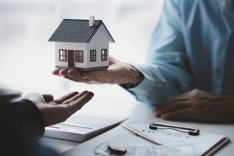 Real Estate Agents Explain Models of Housing Estates in Projects To ...