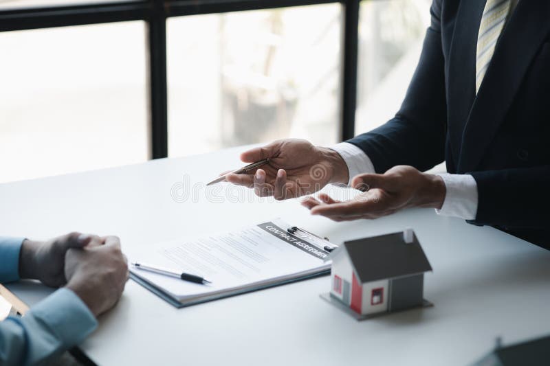 Real Estate Agents Explain Models of Housing Estates in Projects To ...