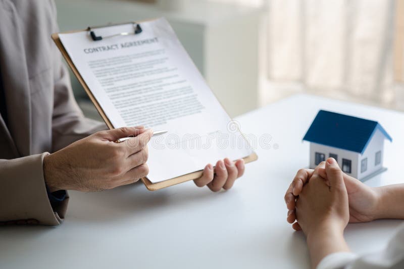 Real Estate Agents Explain Models of Housing Estates in Projects To ...