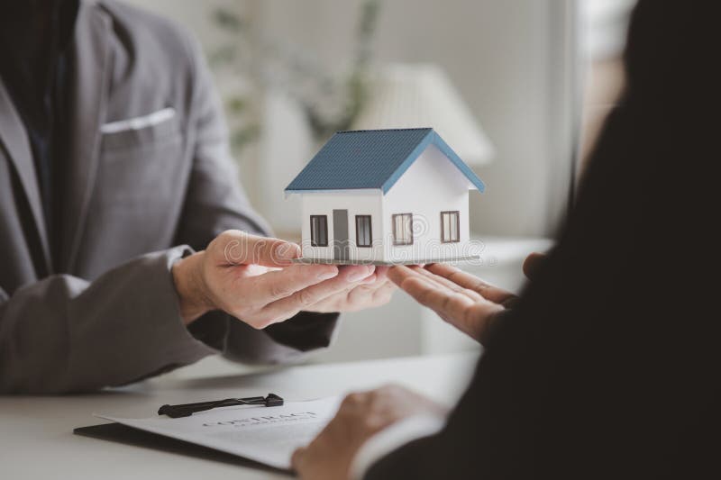 Real Estate Agents Explain Models of Housing Estates in Projects To ...