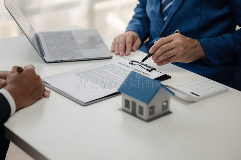 Real Estate Agents Explain Models of Housing Estates in Projects To ...