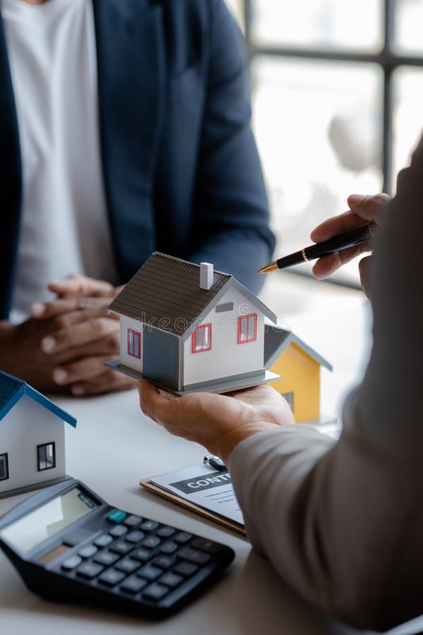 Real Estate Agents Explain Models of Housing Estates in Projects To ...