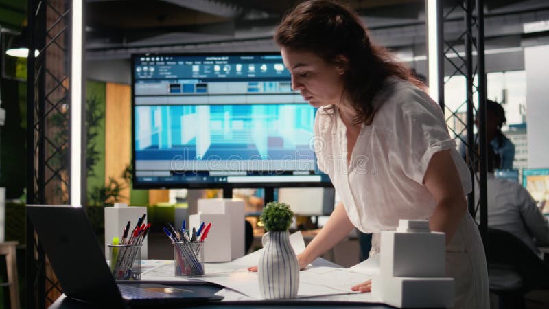 Real Estate Developer Reviews Master Plan with Construction Layouts Stock Video - Video of staff ...