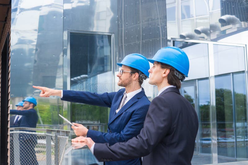 Real Estate Developers in Helmets. New Office Construction Stock Image ...
