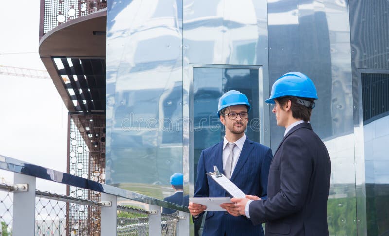Real Estate Developers in Helmets. New Office Construction Stock Image ...