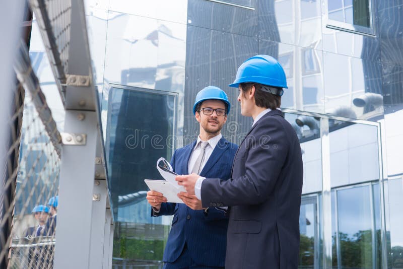 Real Estate Developers in Helmets. New Office Construction Stock Image ...