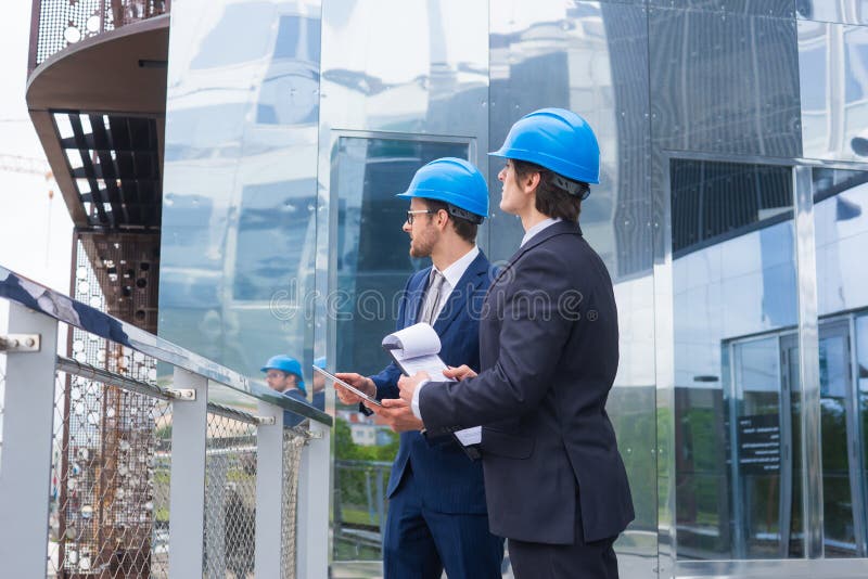 Real Estate Developers in Helmets. New Office Construction Stock Image ...