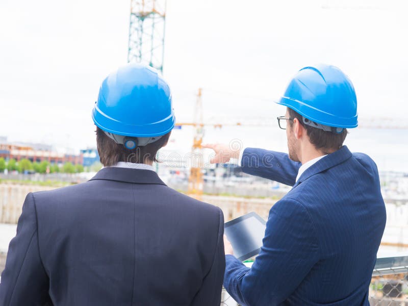 Real Estate Developers in Helmets. New Office Construction Stock Image ...